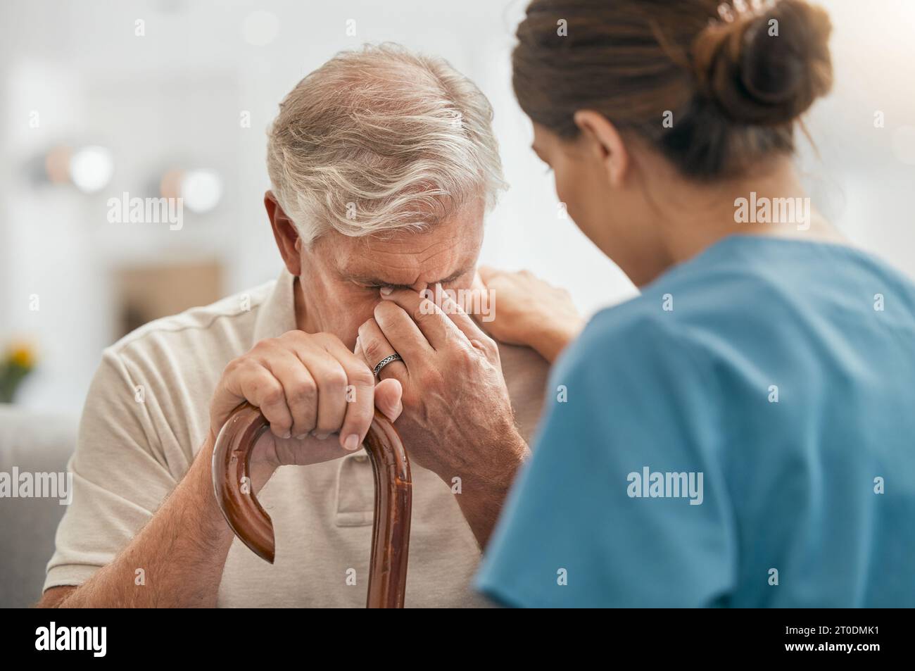 Nurse, support and sad senior man with cane, depression and anxiety in ...