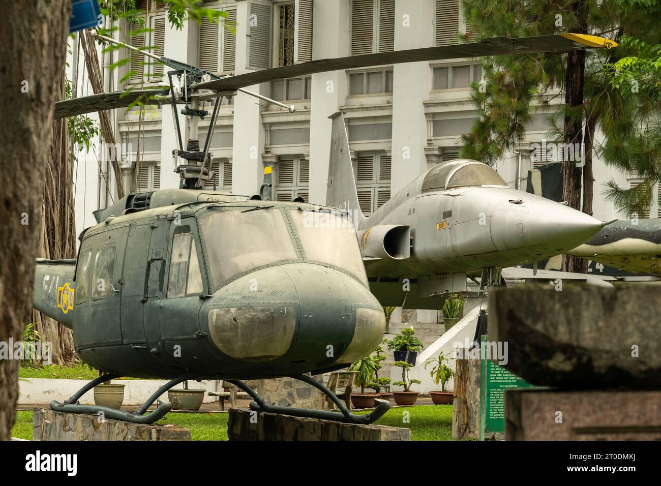 Historic Huey Helicopter and Northrop F5 outside the Museum of Ho Chi ...