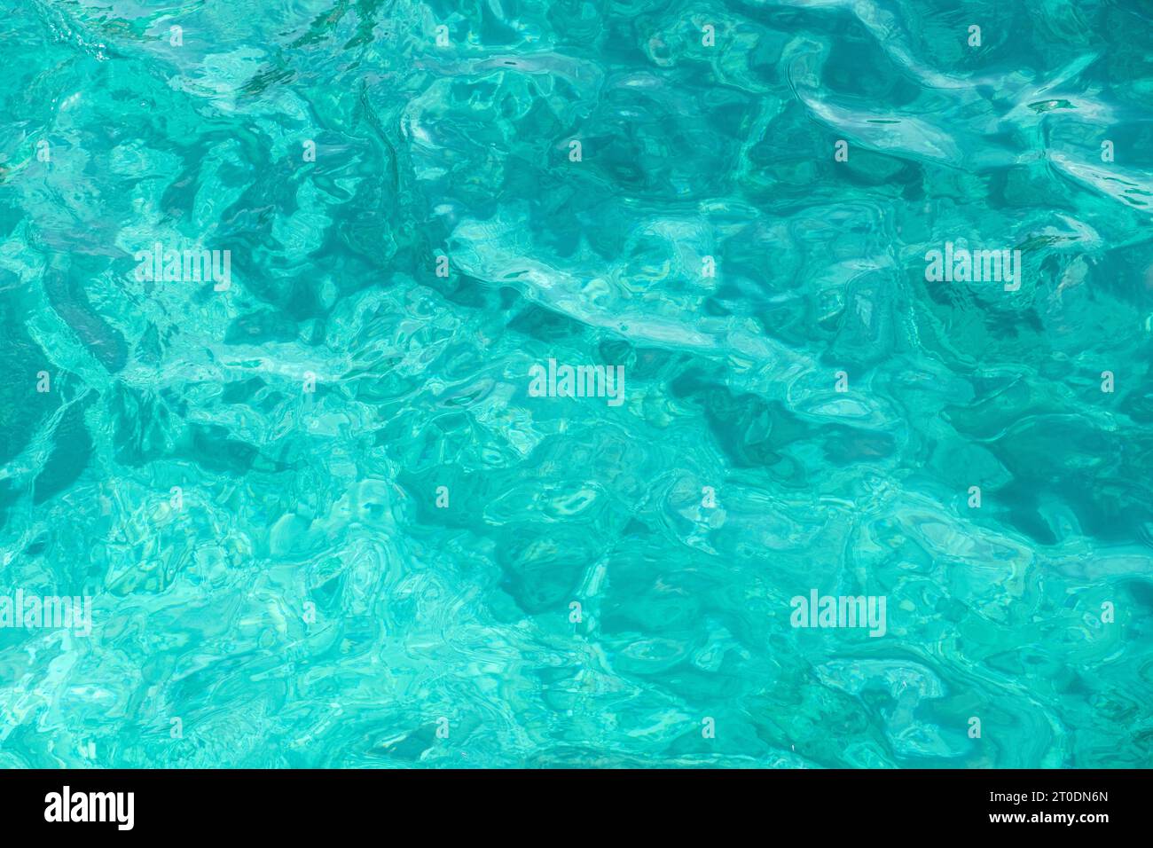 The water is crystal clear and very clean in Cala S'Almunia Stock Photo ...