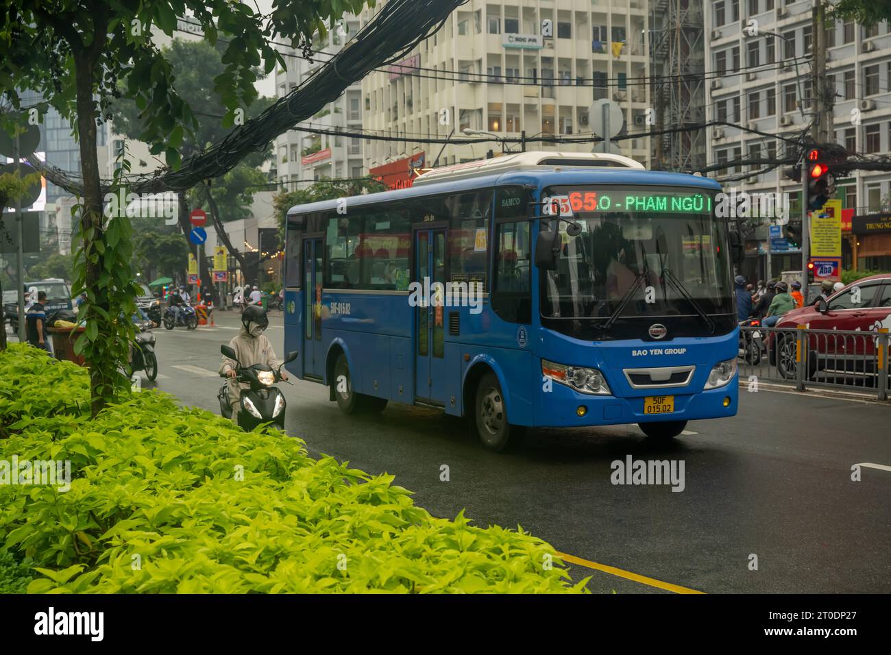 A Vietnamese Samco bus during rush hour on the streets of Ho Chi Minh ...