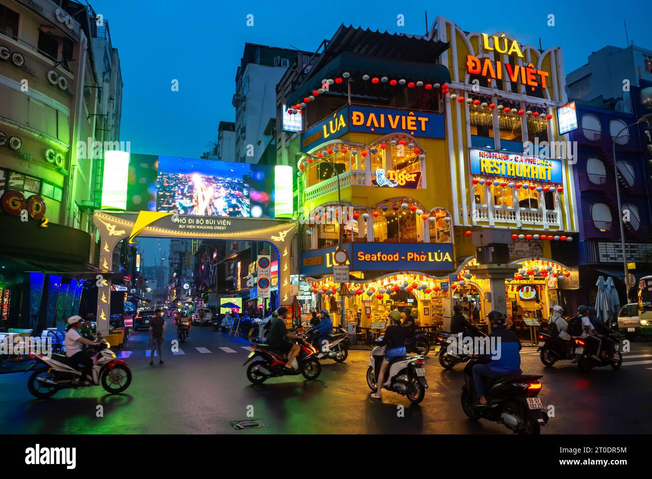 Illuminated front entrance to the Bui Vien Walking Street at night, Ho Chi Minh City, Vietnam ...