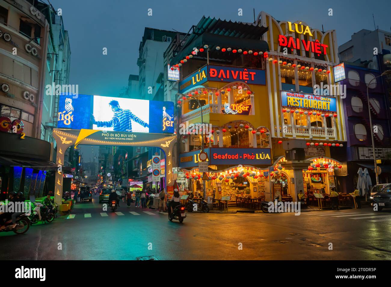 Illuminated front entrance to the Bui Vien Walking Street at night, Ho ...