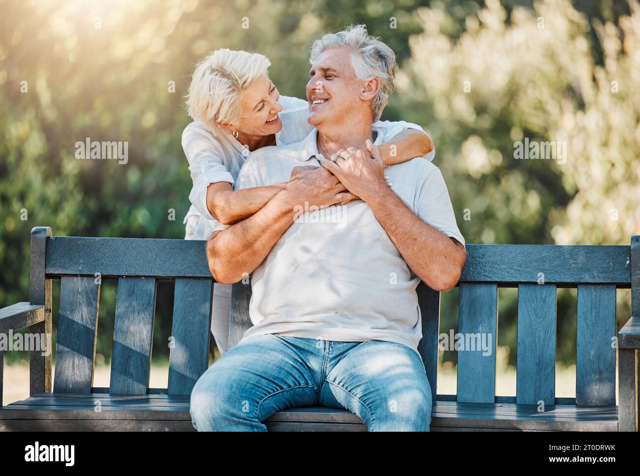 Happy couple, senior and hug on park bench for love, support and ...