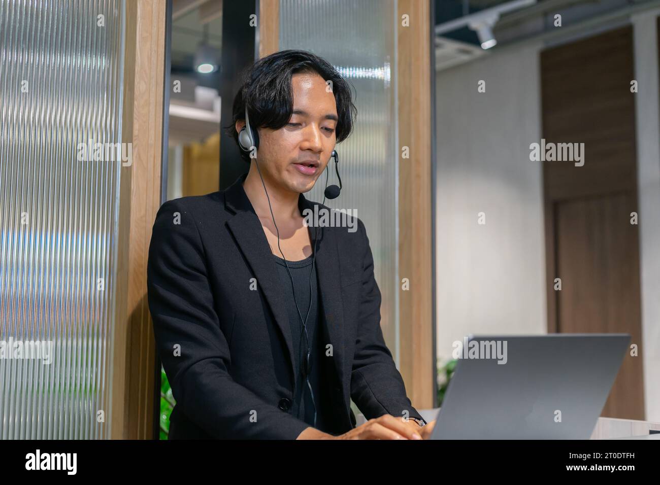 Customer service talking and helping the client. A call center of ...