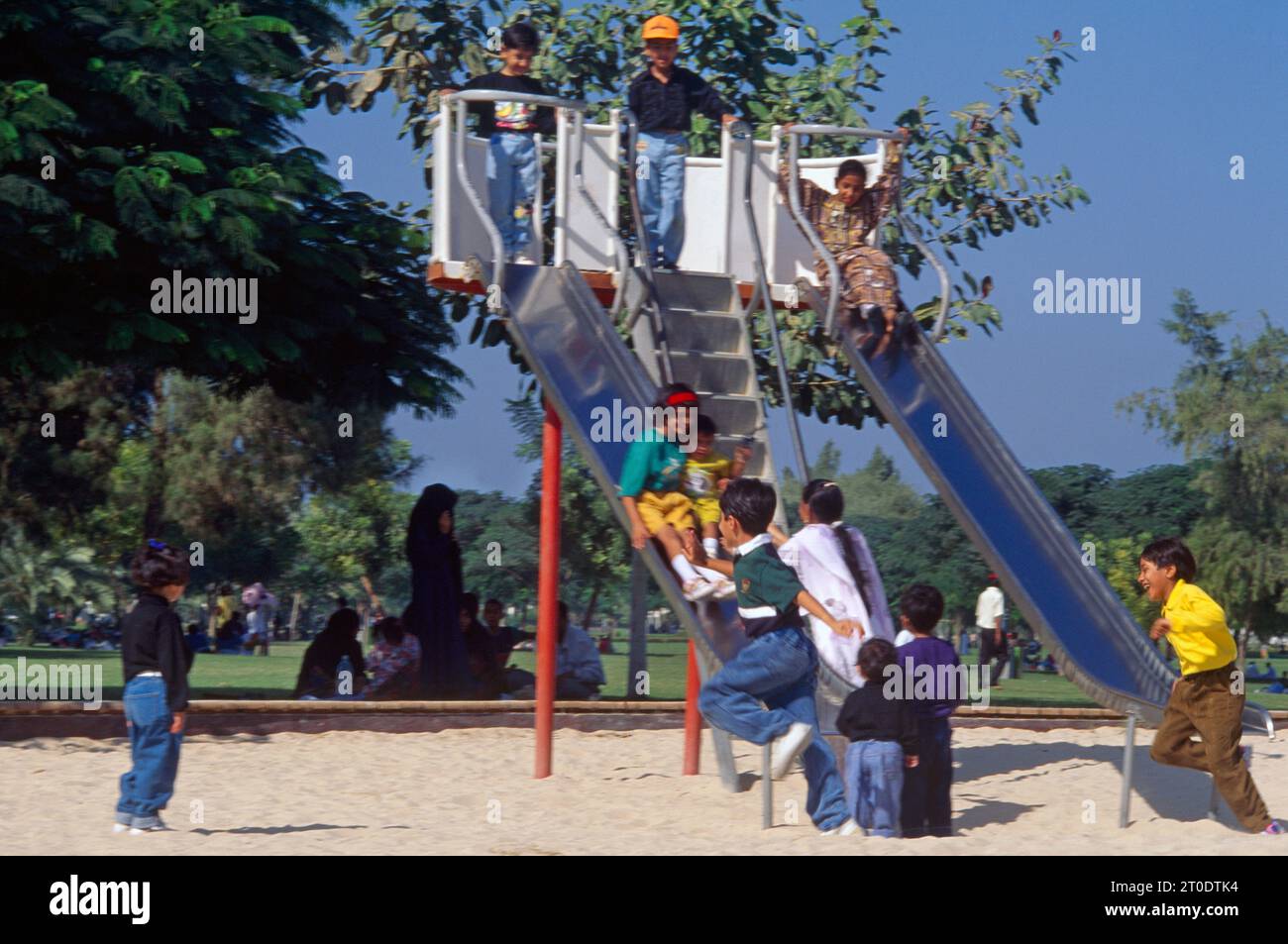 Dubai UAE Safa Park Children On Slides in Playground Stock Photo - Alamy