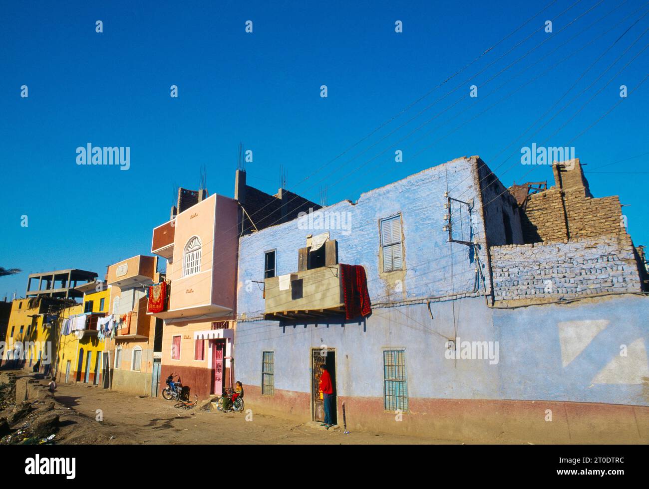 Luxor Egypt People Outside Colourful Houses Stock Photo - Alamy