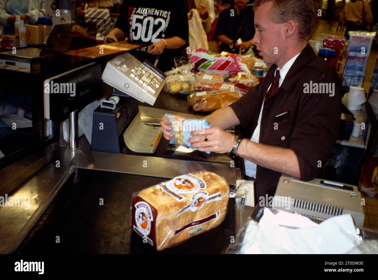 Cashier scanning barcode hi-res stock photography and images - Alamy