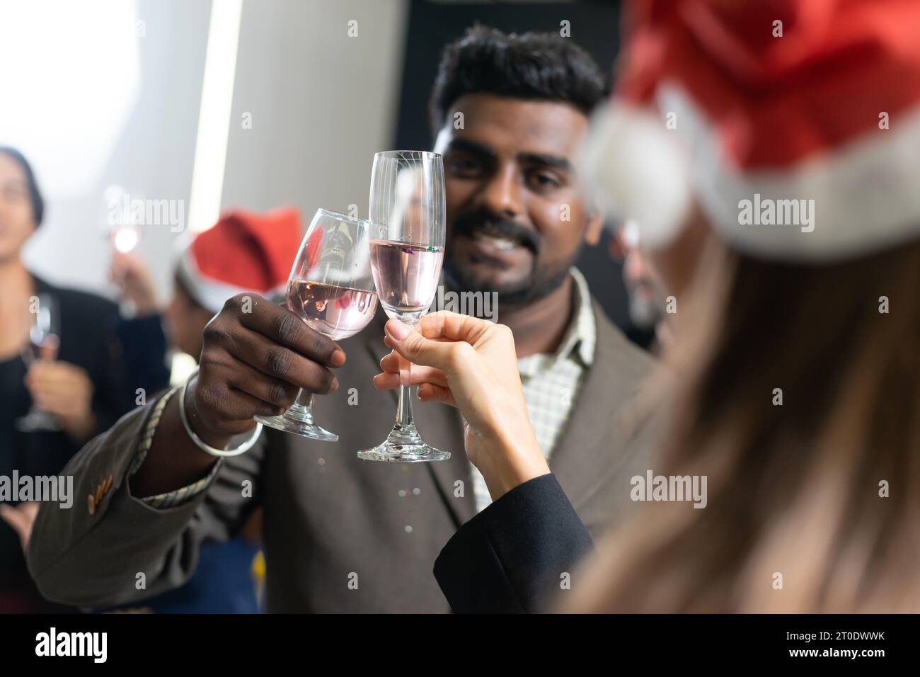 Making a toast, Cheers !! An Indian businessman and colleagues having ...