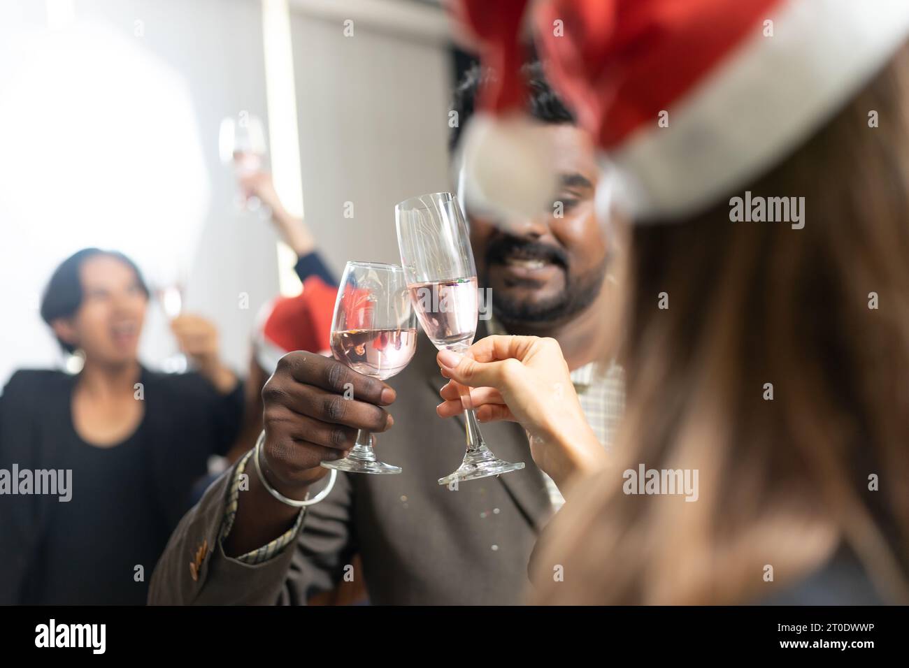 Making a toast, Cheers !! An Indian businessman and colleagues having ...