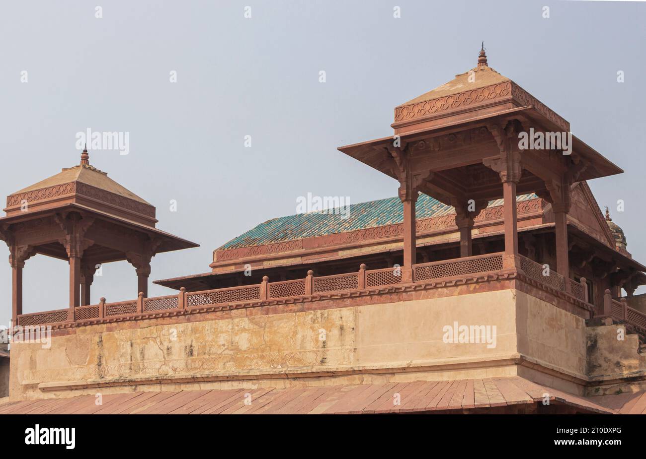 Ornate roof tops of an old indian fort made of red stone Stock Photo ...