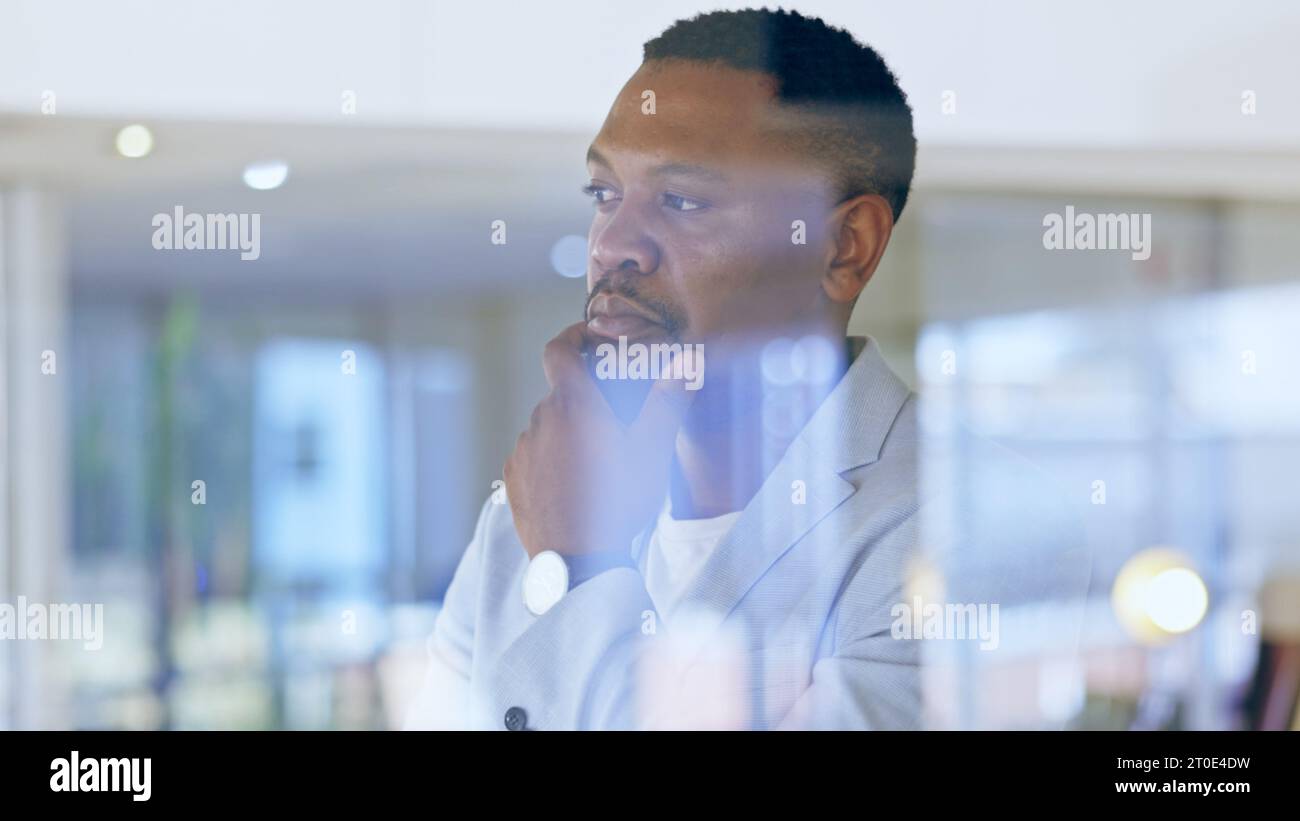Thinking, idea and African businessman in the office with brainstorming ...