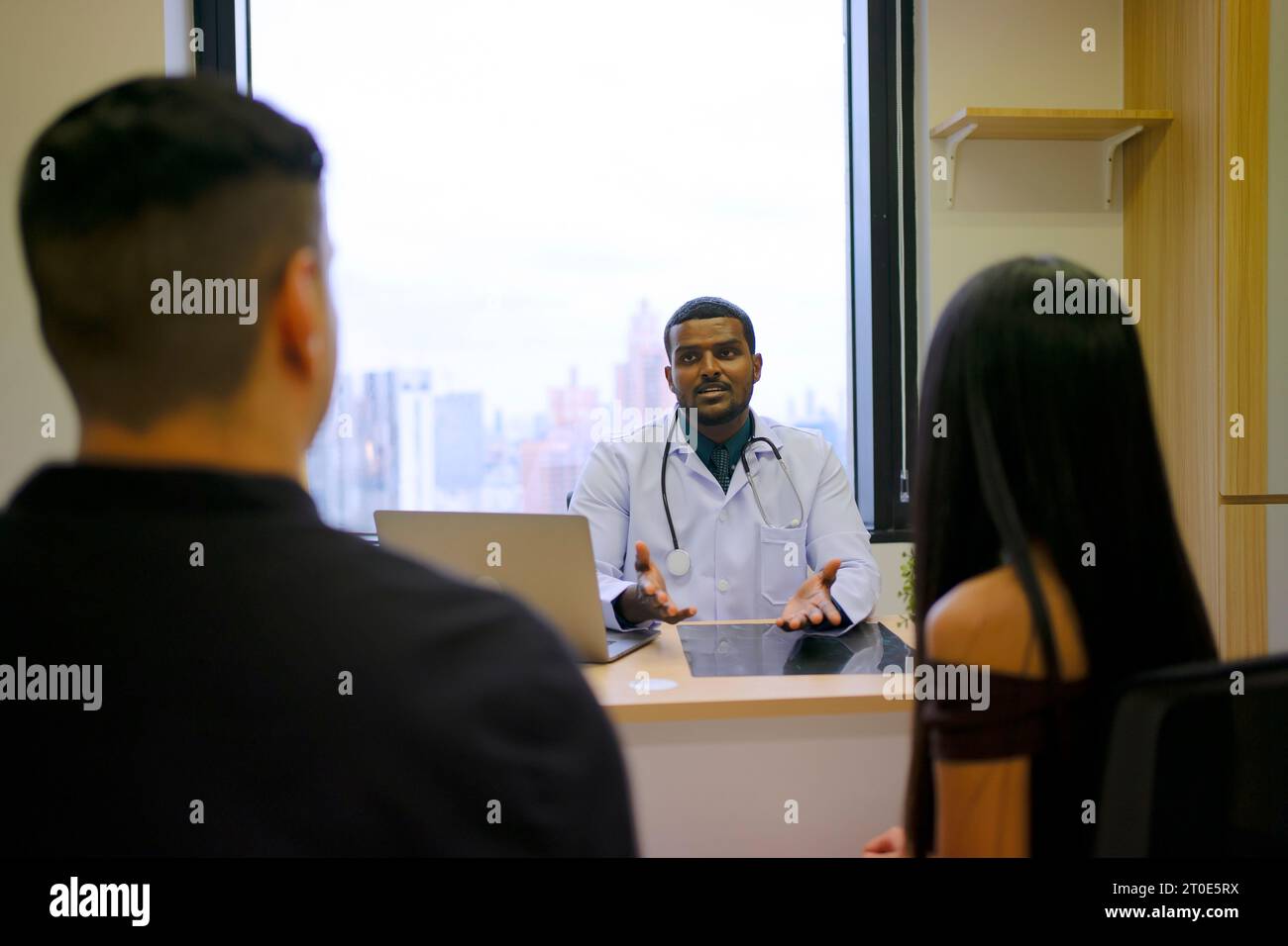 Doctors are meeting with patient at meeting room. Healthcare and ...