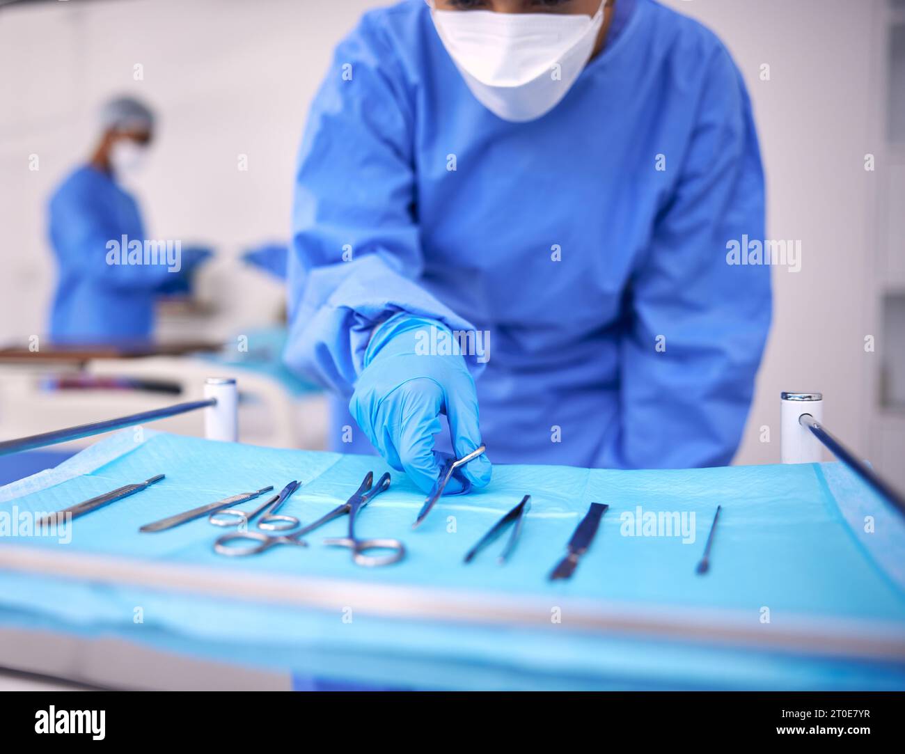 Nurse, surgery and prepare tools in operation, medical equipment and ...