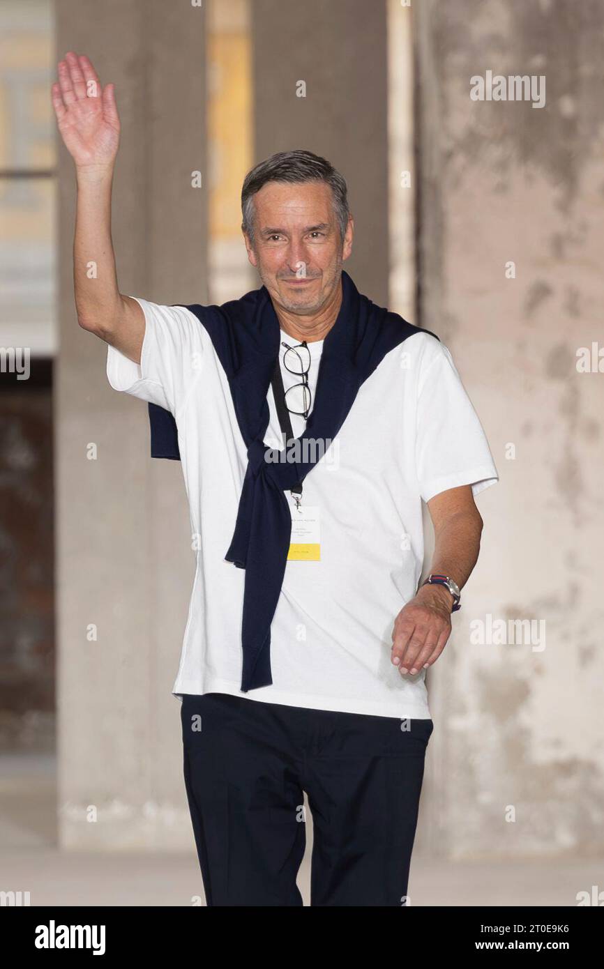 Designer Dries Van Noten acknowledges applause following the Dries Van ...