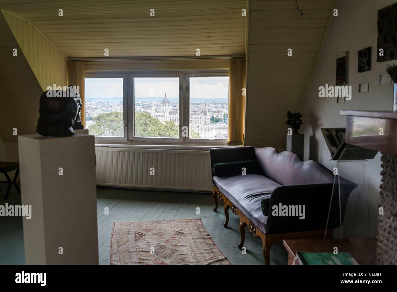 View of the Hungarian Parliament through a window of a house in Táncsics Mihály street, Buda ...