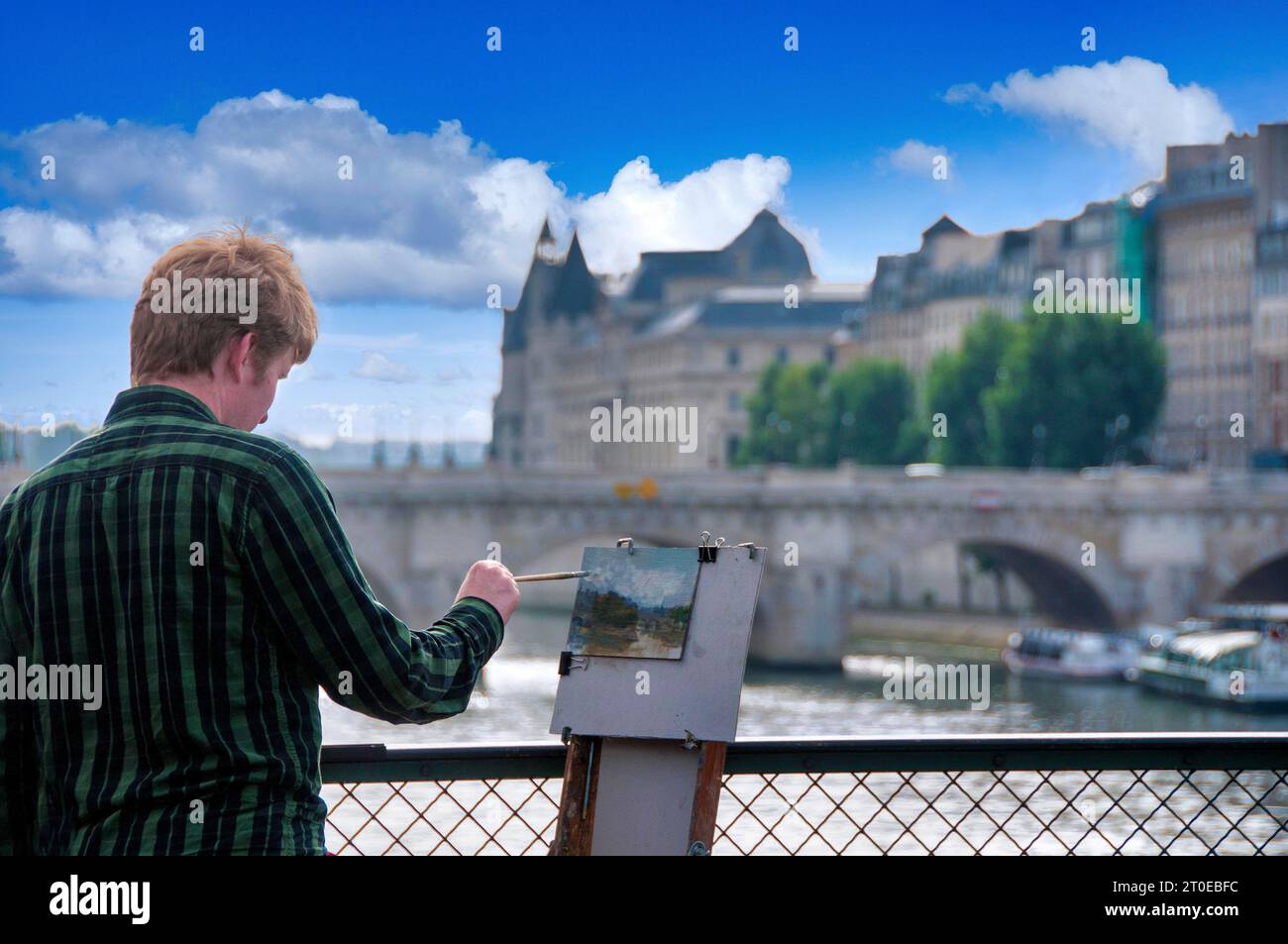 Paris. Painter painting the Pont Neuf. Ile de la Cite. Ile de France ...