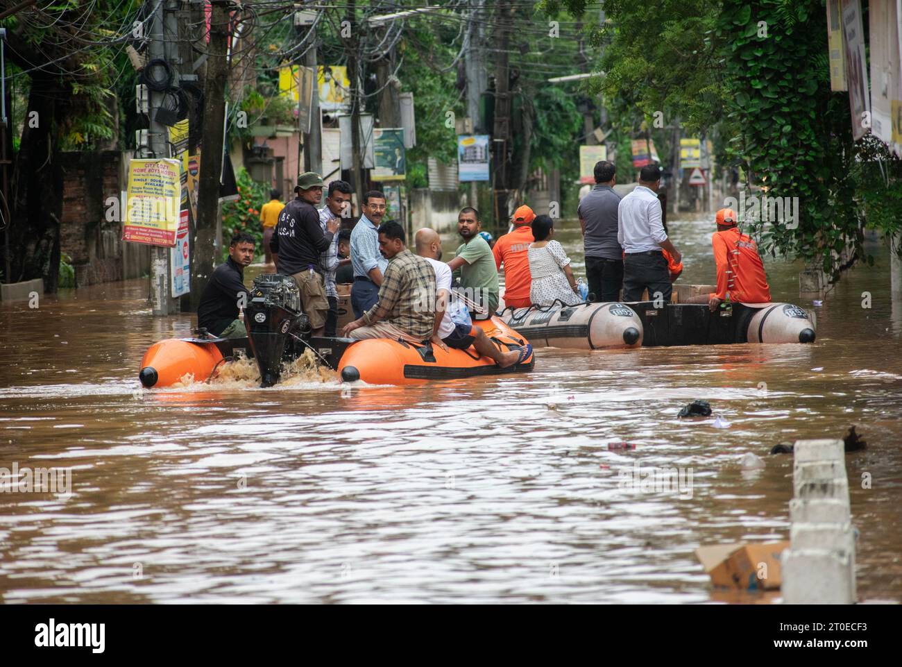 National Disaster Response Force (NDRF) personnel rescue people from waterlogged area, after ...