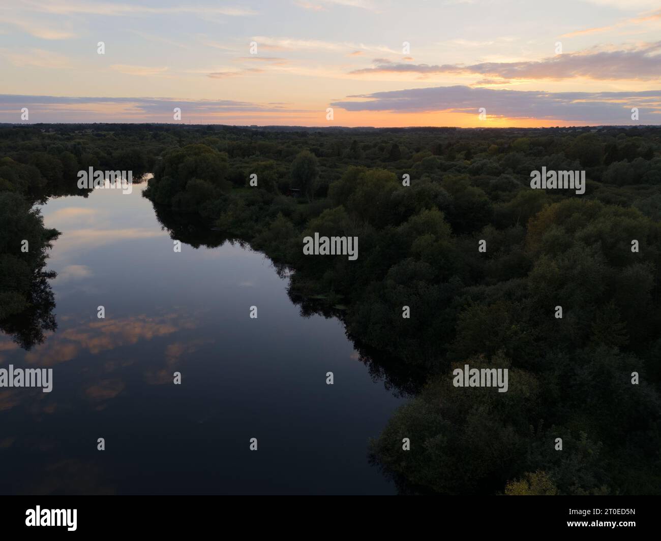 Above the river Yare looking towards Norwich at sunset. With the ...