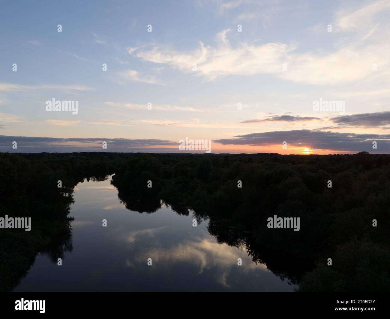 Above the river Yare looking towards Norwich at sunset. With the ...