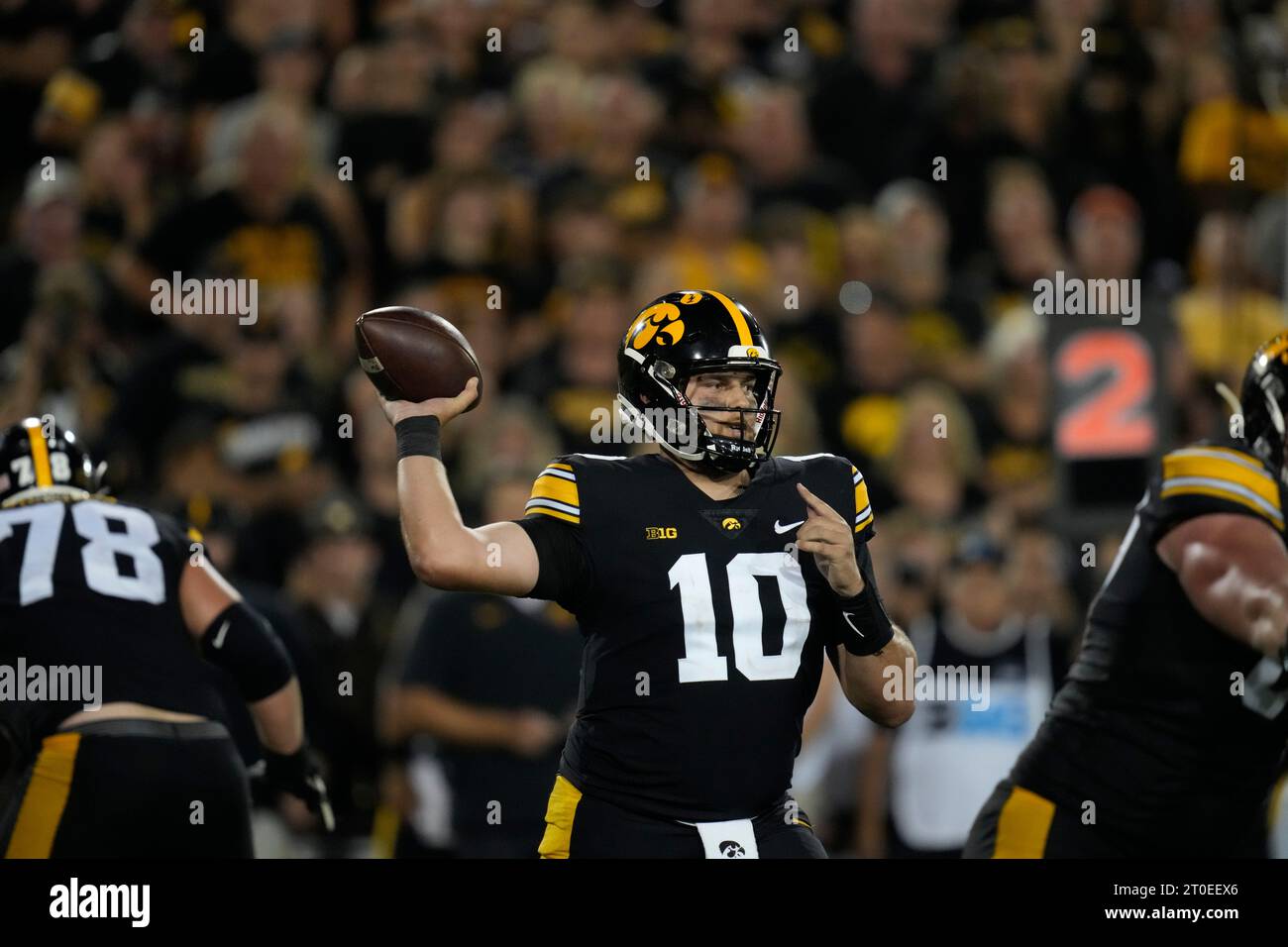 Iowa quarterback Deacon Hill (10) throws a pass during the second half ...
