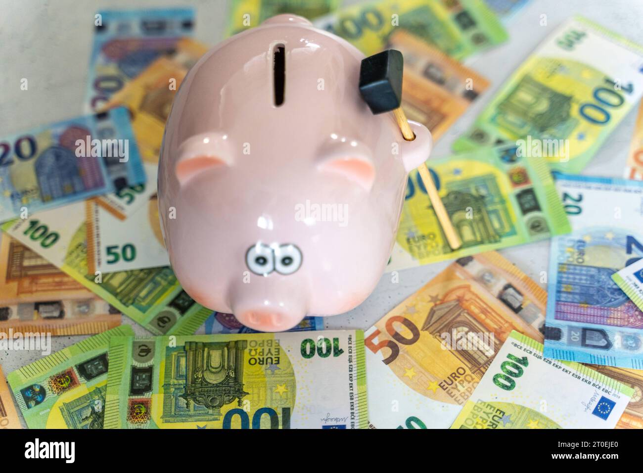 Augsburg, Bavaria, Germany. 5th Oct, 2023. Piggy bank on euro banknotes ...