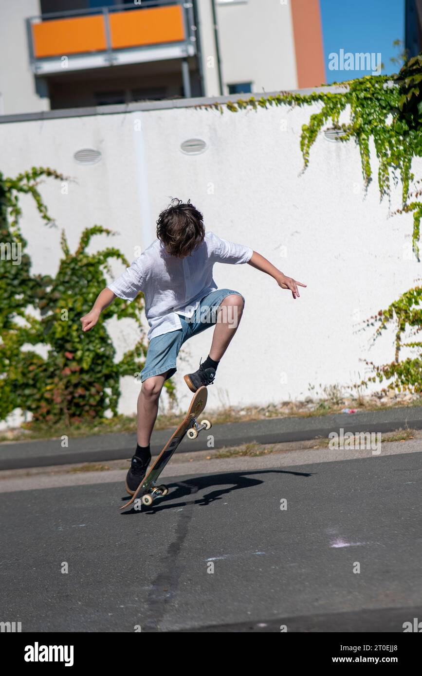 boy on skateboard, Germany Stock Photo - Alamy