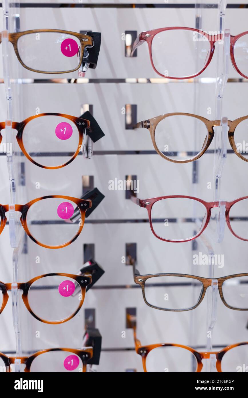 Glasses frames on a display stand Stock Photo - Alamy