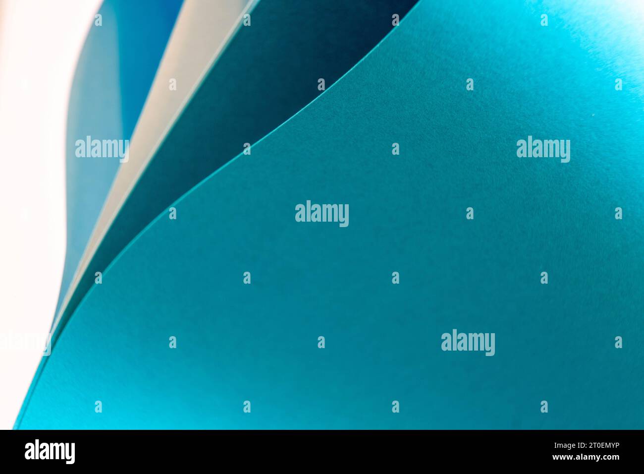 Wavy and curved papers in shades of blue forming abstract shapes Stock ...