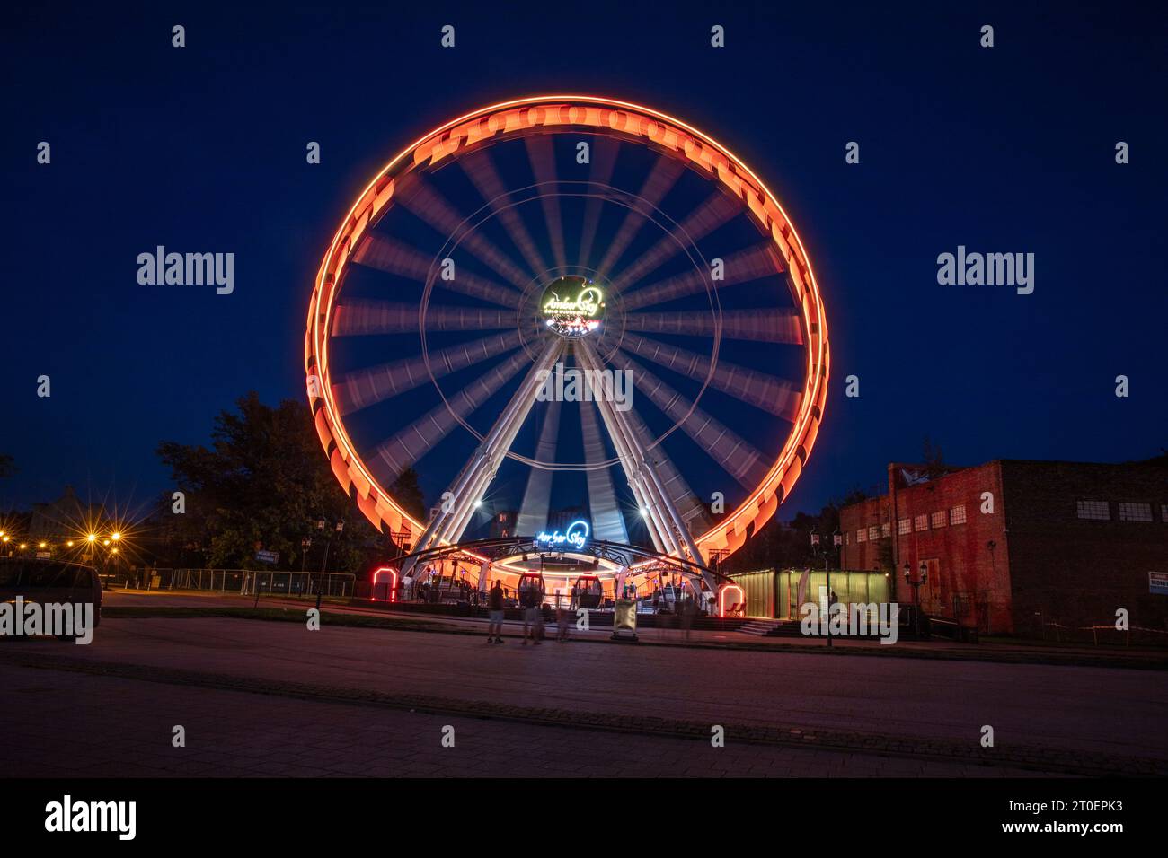 Ferris wheel, illuminated, rotating, Gdansk Stock Photo - Alamy