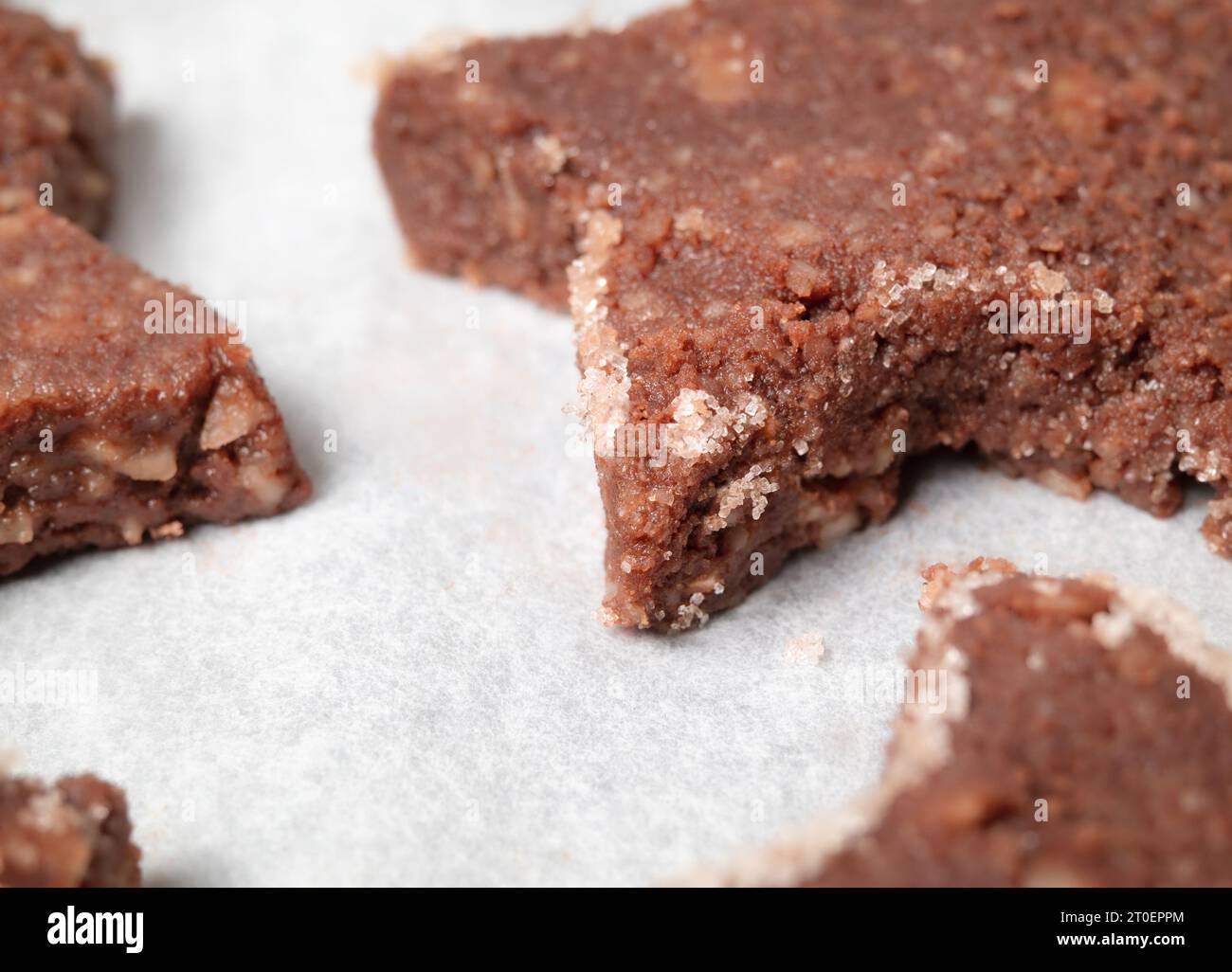 Chocolate cookie on parchment paper. Gluten free almond flour chocolate ...
