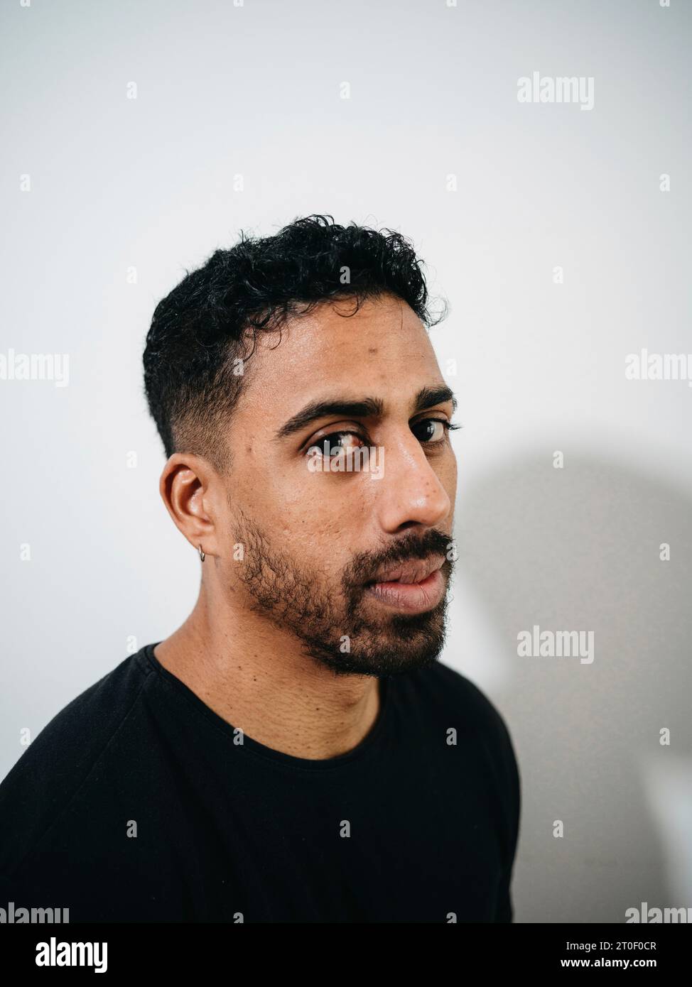 Non-binary man with black t-shirt Stock Photo - Alamy