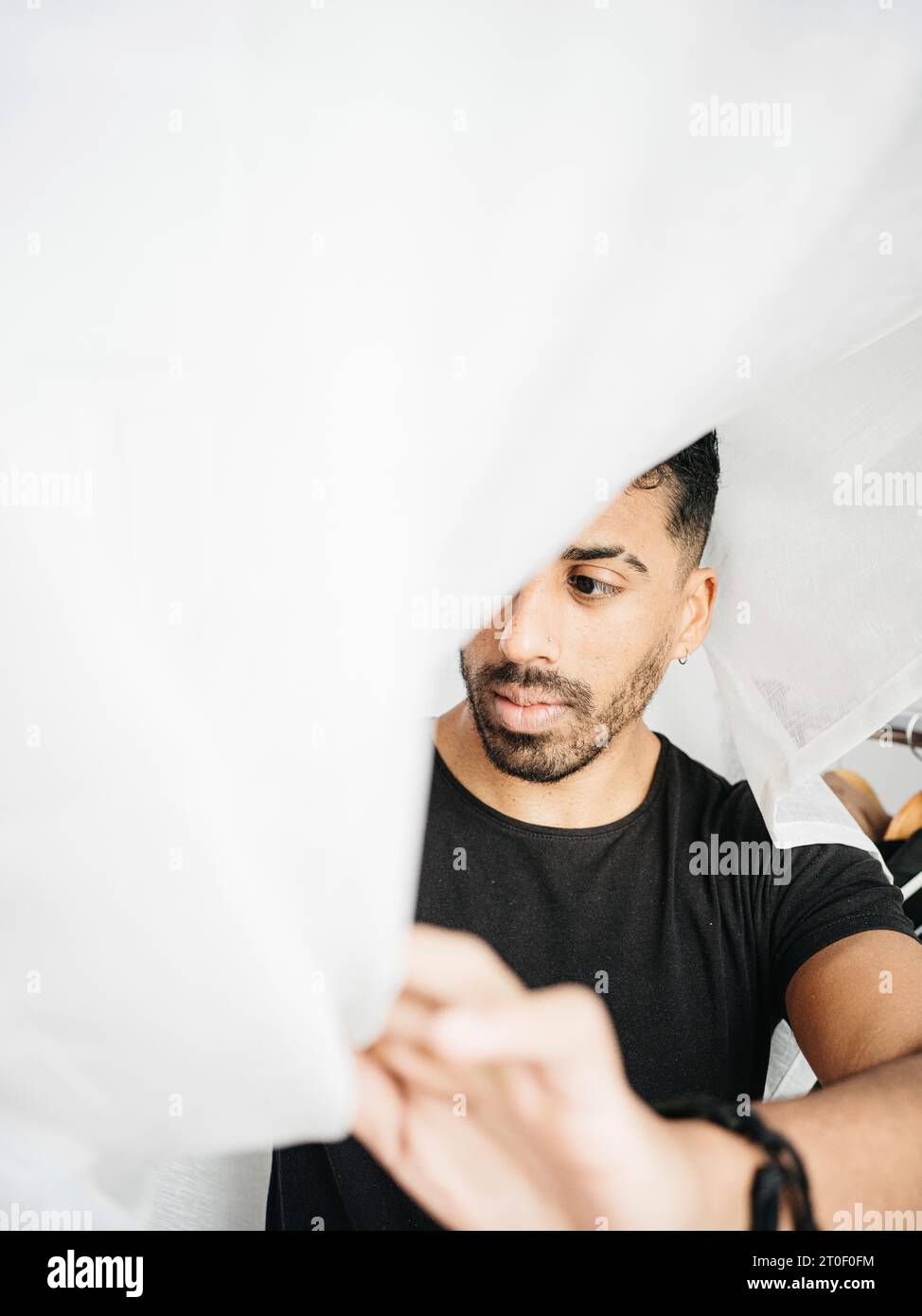Person behind curtain hi-res stock photography and images - Alamy