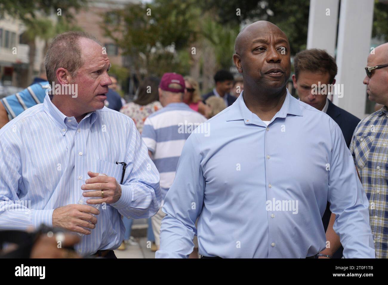 Republican presidential candidate Sen. Tim Scott, R-S.C., walks to talk ...