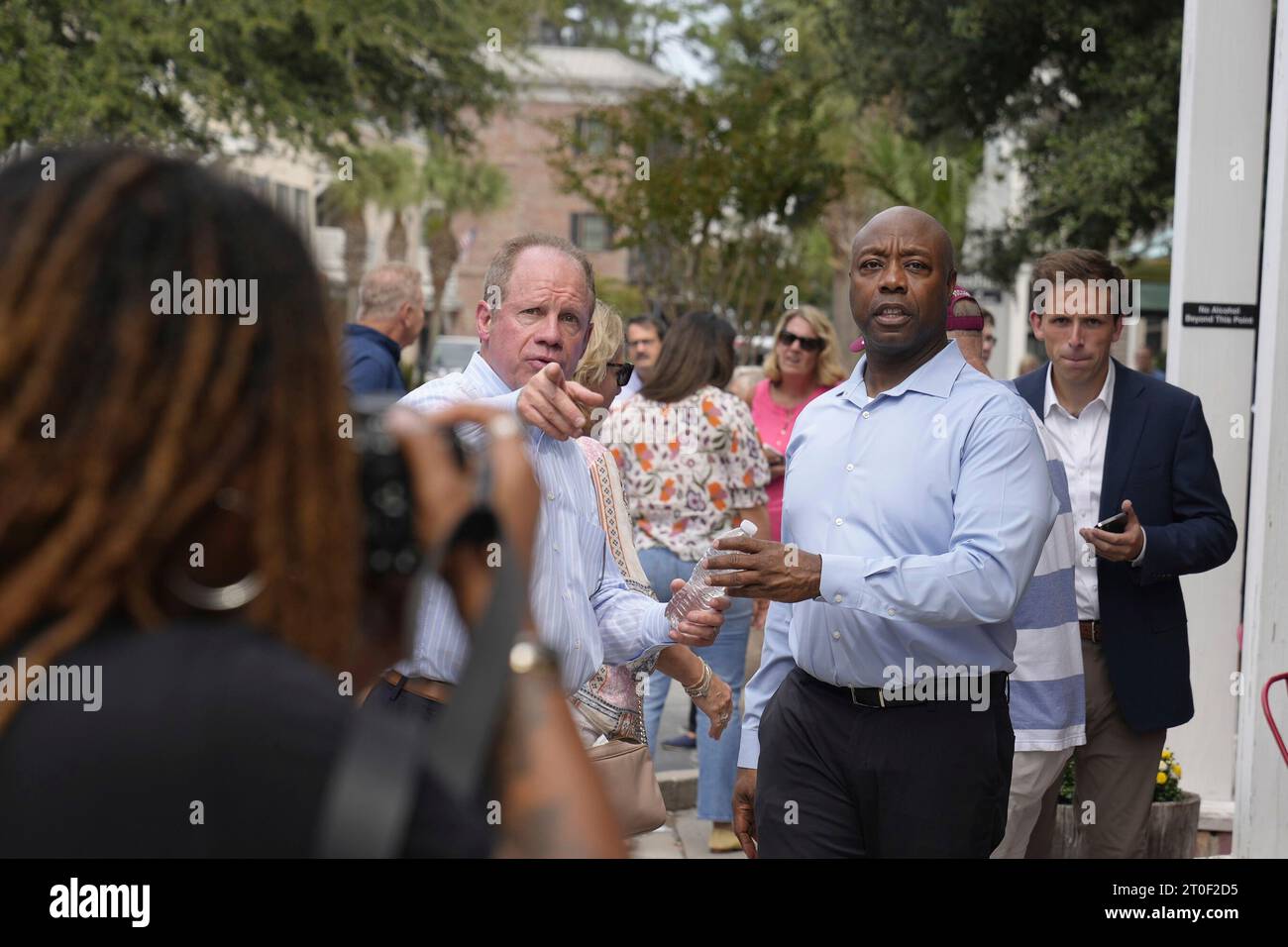 U.S. Sen. Tim Scott, R-S.C., center right, heads to talk to reporters ...