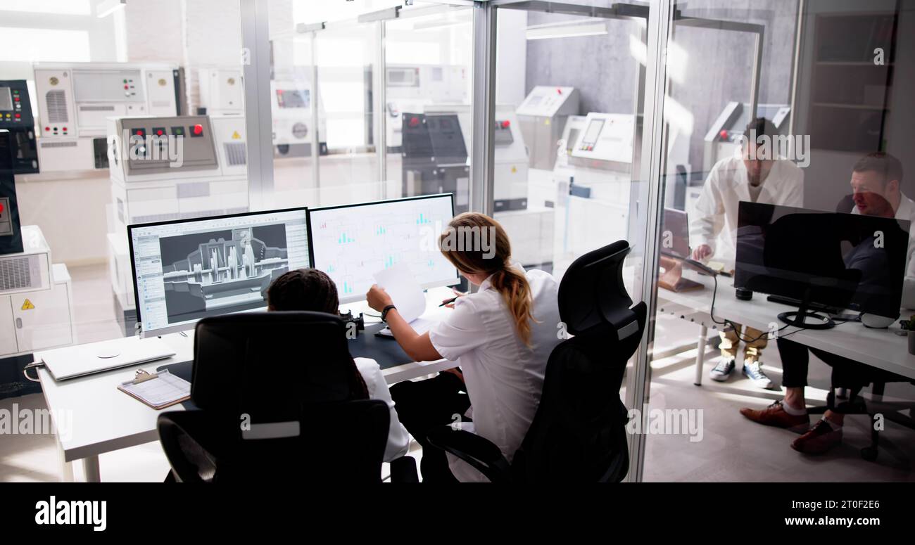 Engineer Doing 3D CAD Model Design On Computer At Factory Stock Photo ...