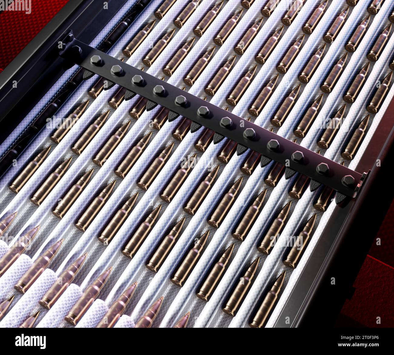A production line at an ammo factory with freshly manufactured bullets ...