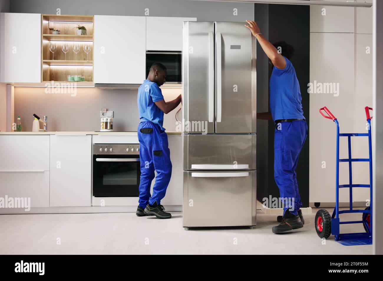 Man move fridge hi-res stock photography and images - Alamy