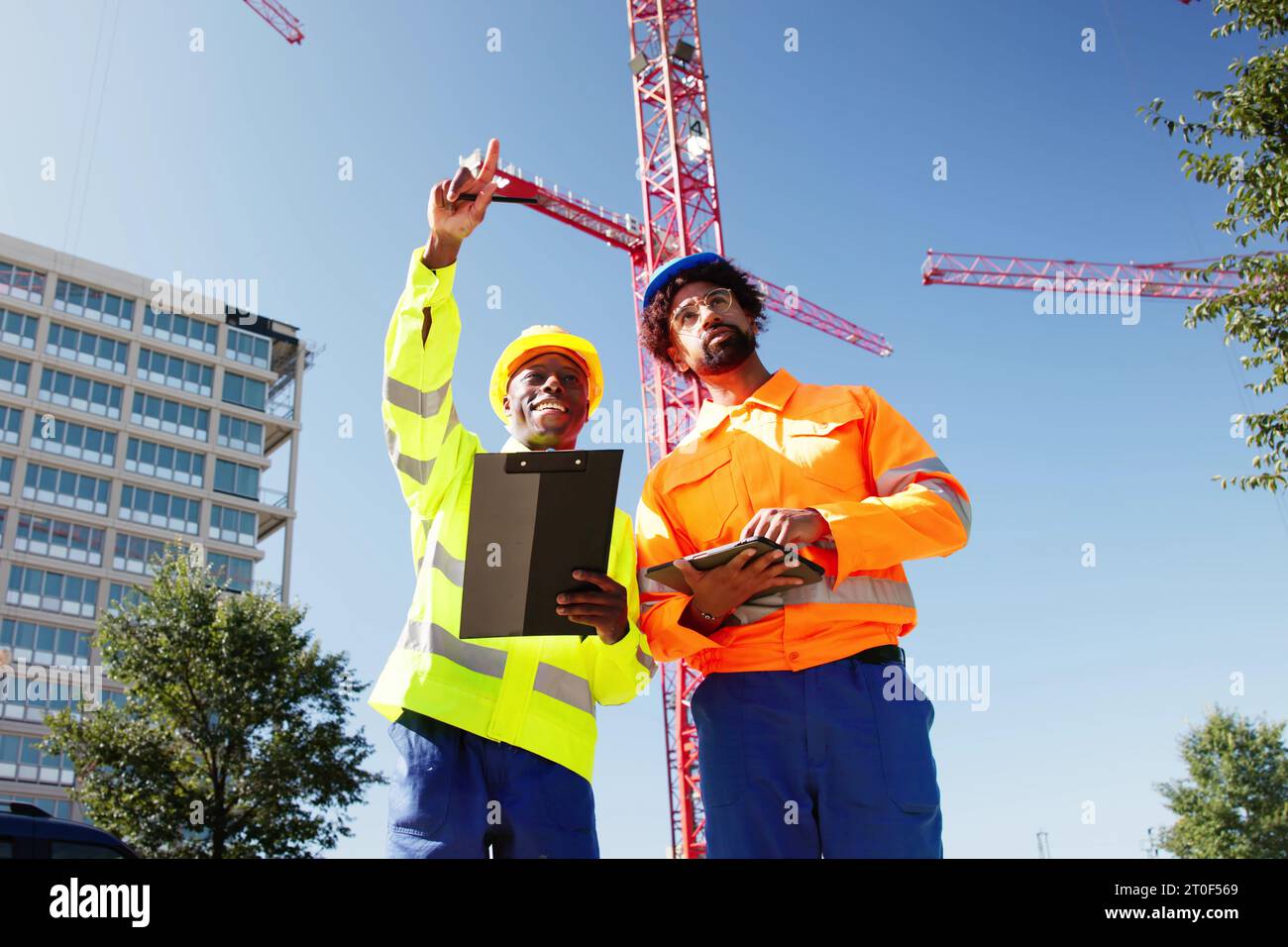 OSHA Inspector At Construction Site. Young Engineer Worker Stock Photo ...