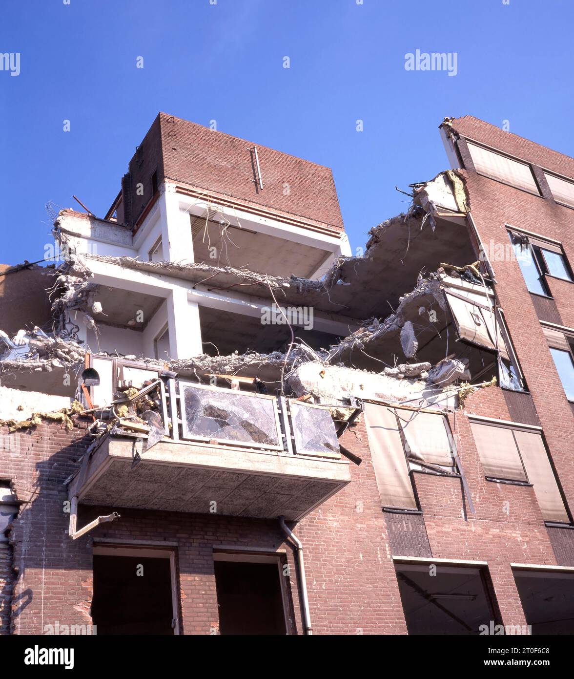 Apartment building after earthquake against clear blue sky Stock Photo ...