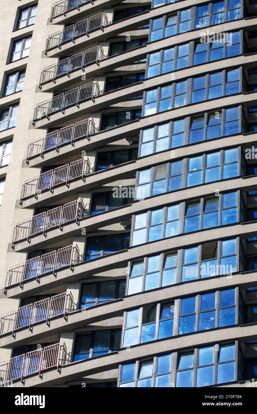 Windows of a tall modern building close up Stock Photo - Alamy