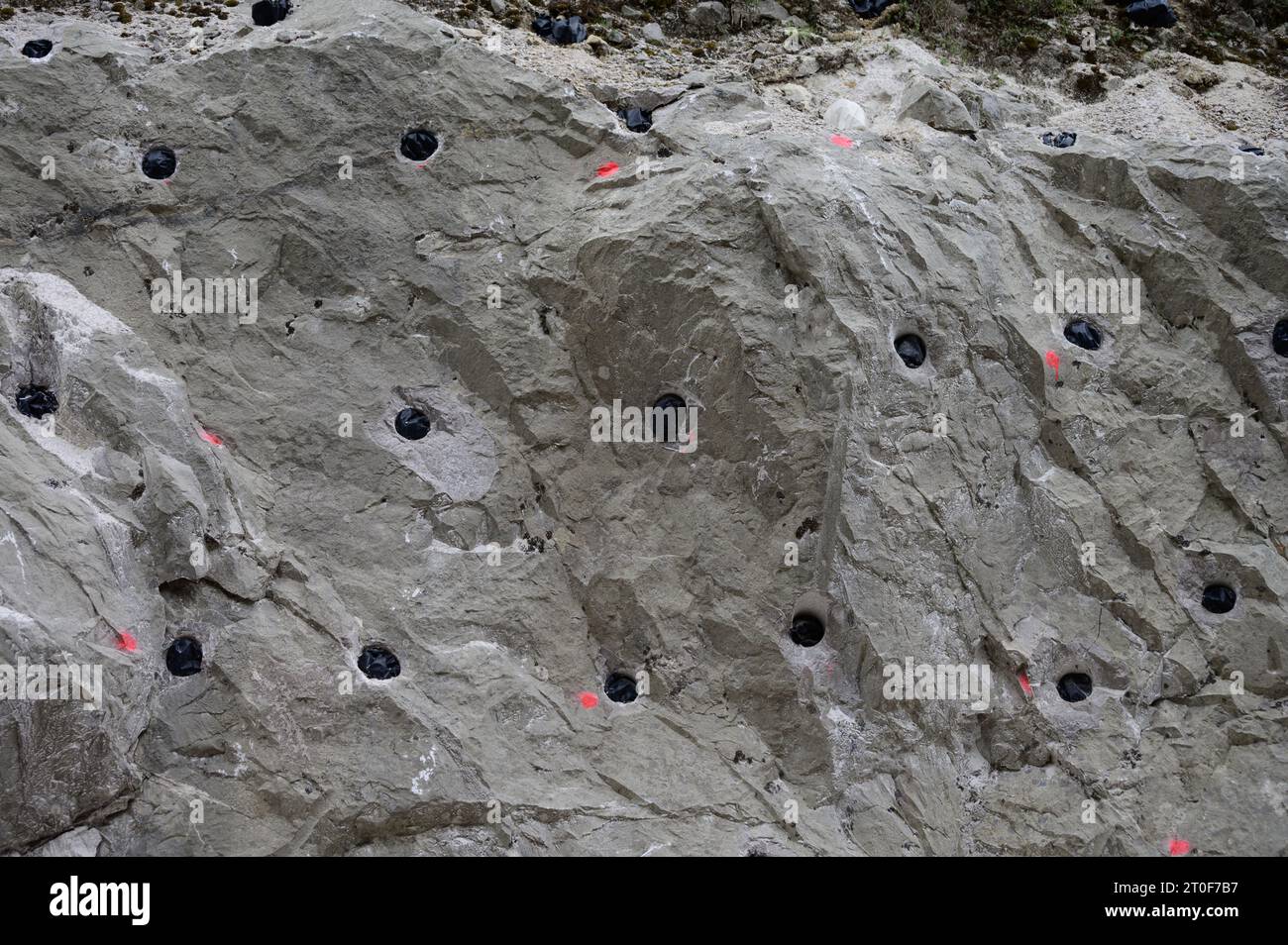 Road construstion works, dynamite hols for blasting of rock in ...