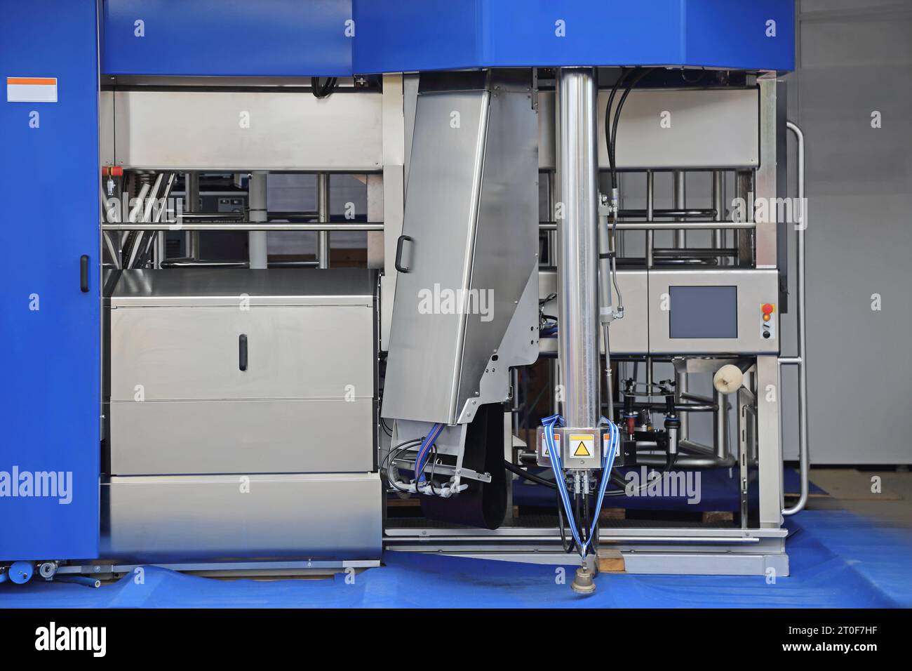 Automatic Cow Milking Robot Machine at Dairy Farm Stock Photo - Alamy