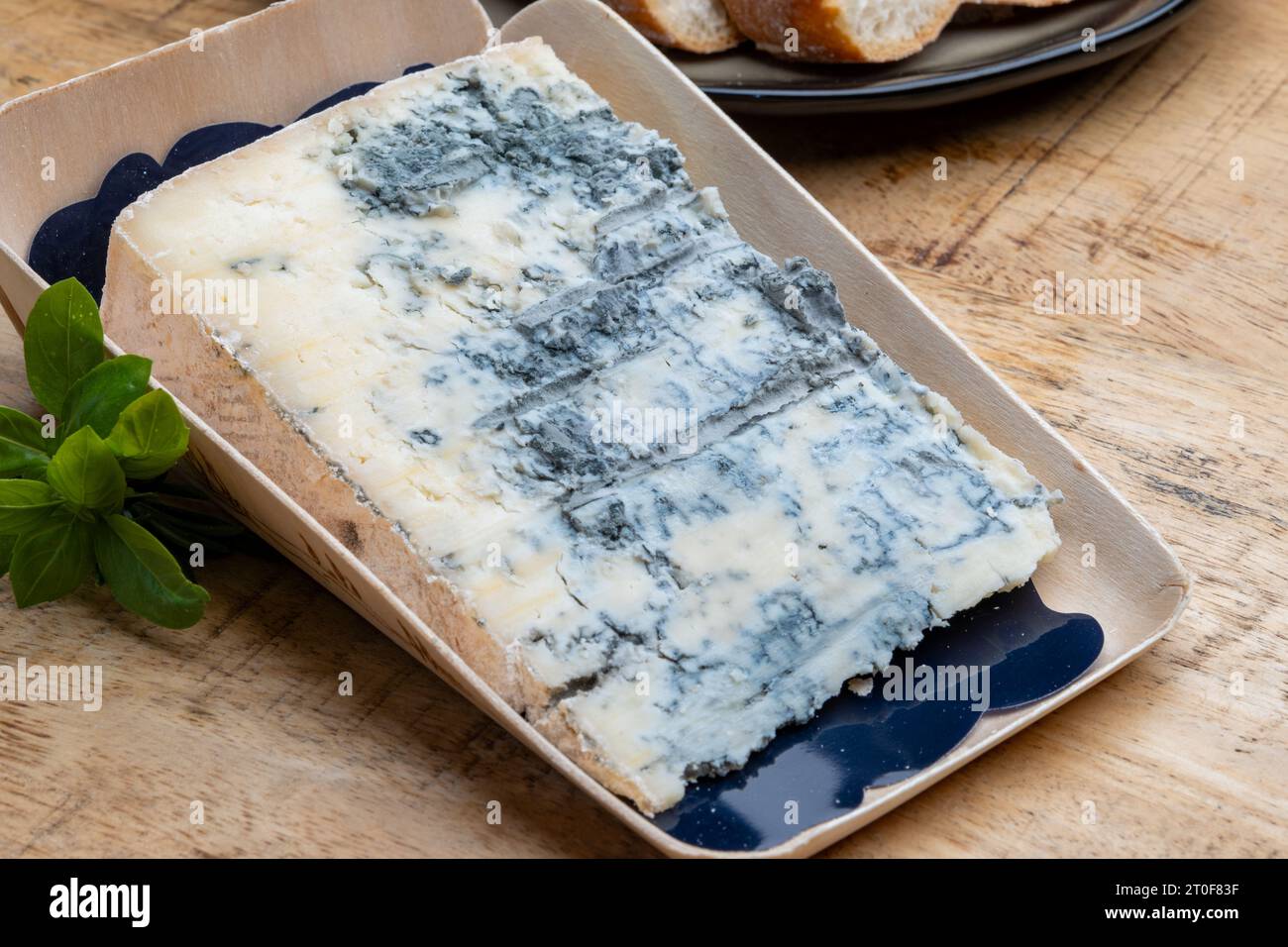 Cheese collection, piece of italian blue cheese gorgonzola picante with ...