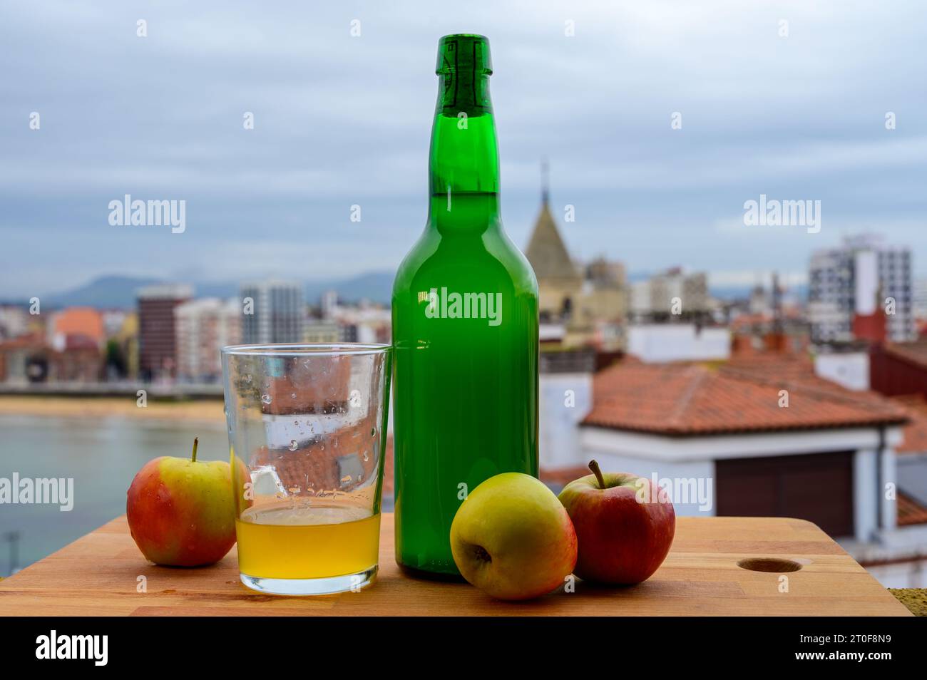 Traditional natural Asturian cider made from fermented apples in wooden ...