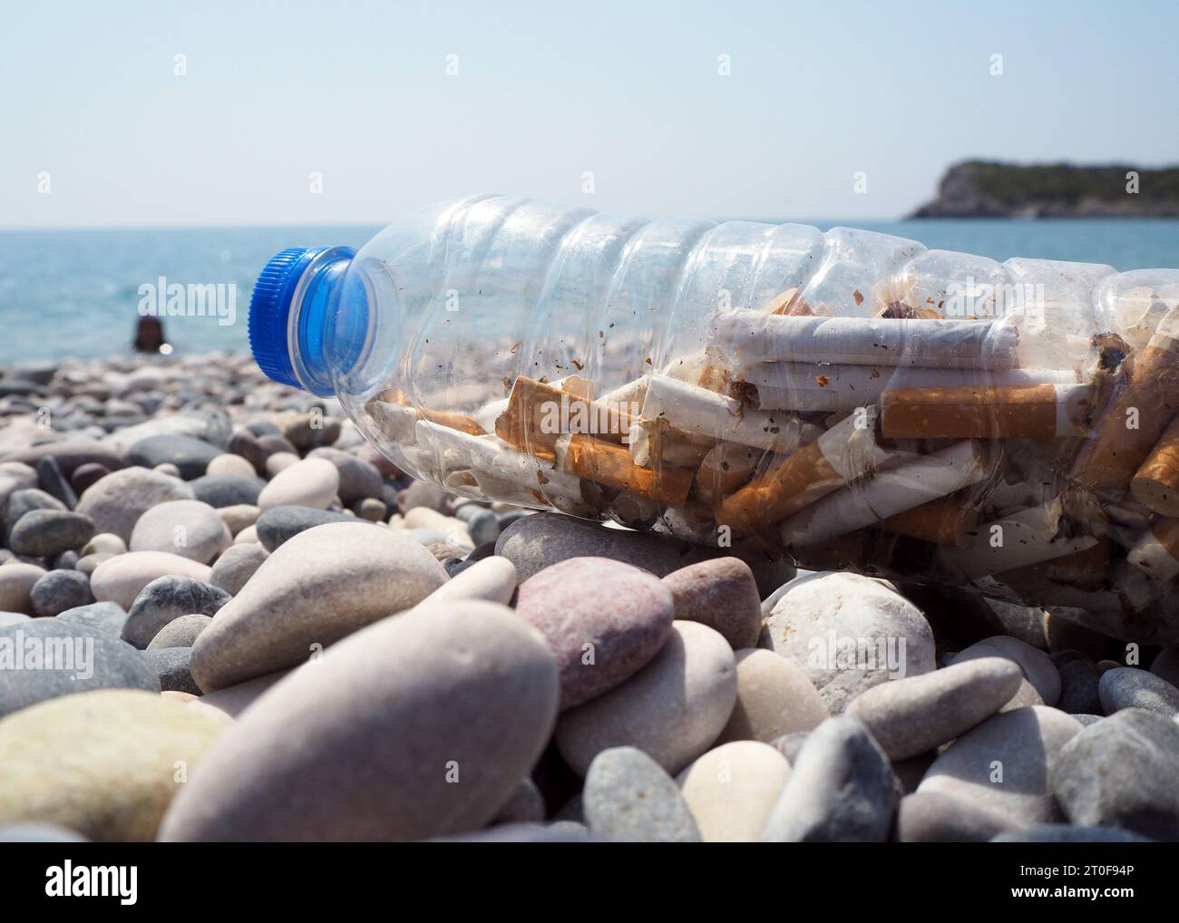 Marine litter and plastic materials beach pollution. Butt pollution in ...