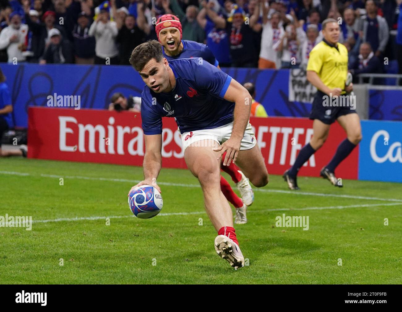 France's Damian Penaud scores the opening try during the Rugby World ...