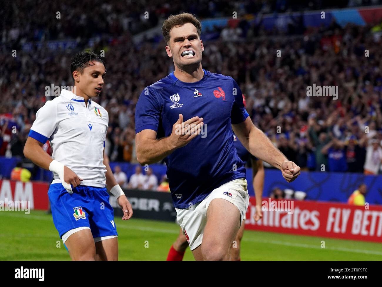 France's Damian Penaud celebrates scoring the opening try during the ...