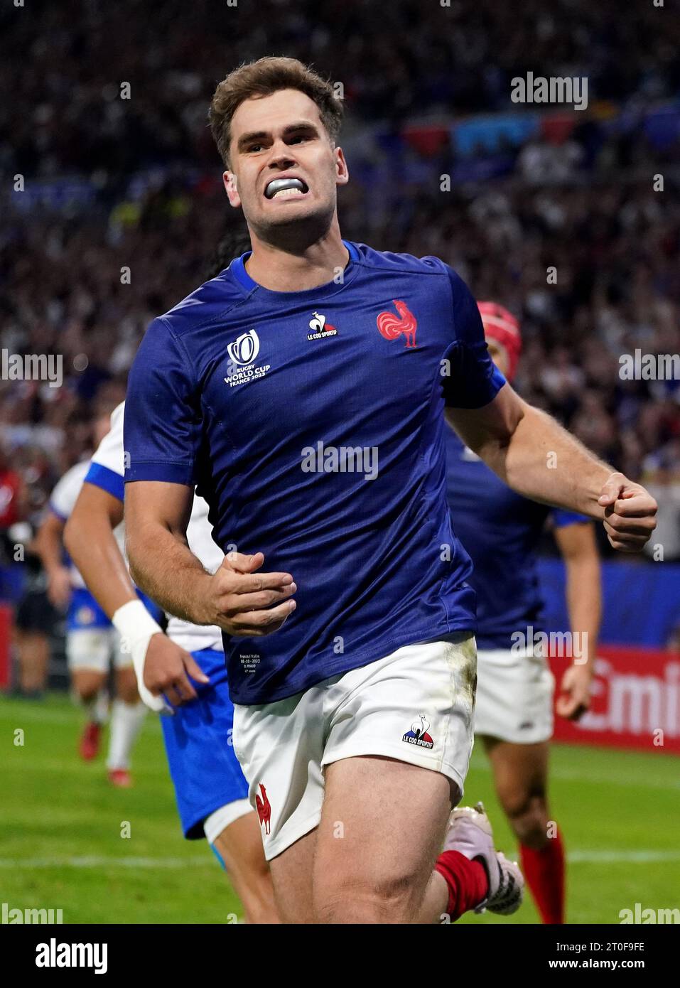 France's Damian Penaud celebrates scoring the opening try during the ...