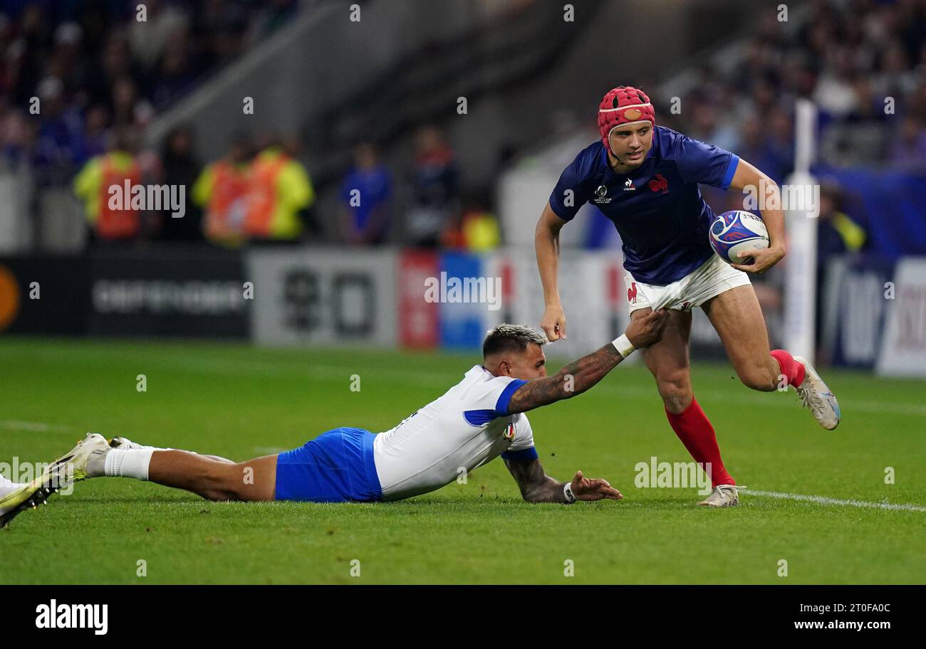 Italy's Pierre Bruno tries to tackle France's Louis Bielle Biarrey ...