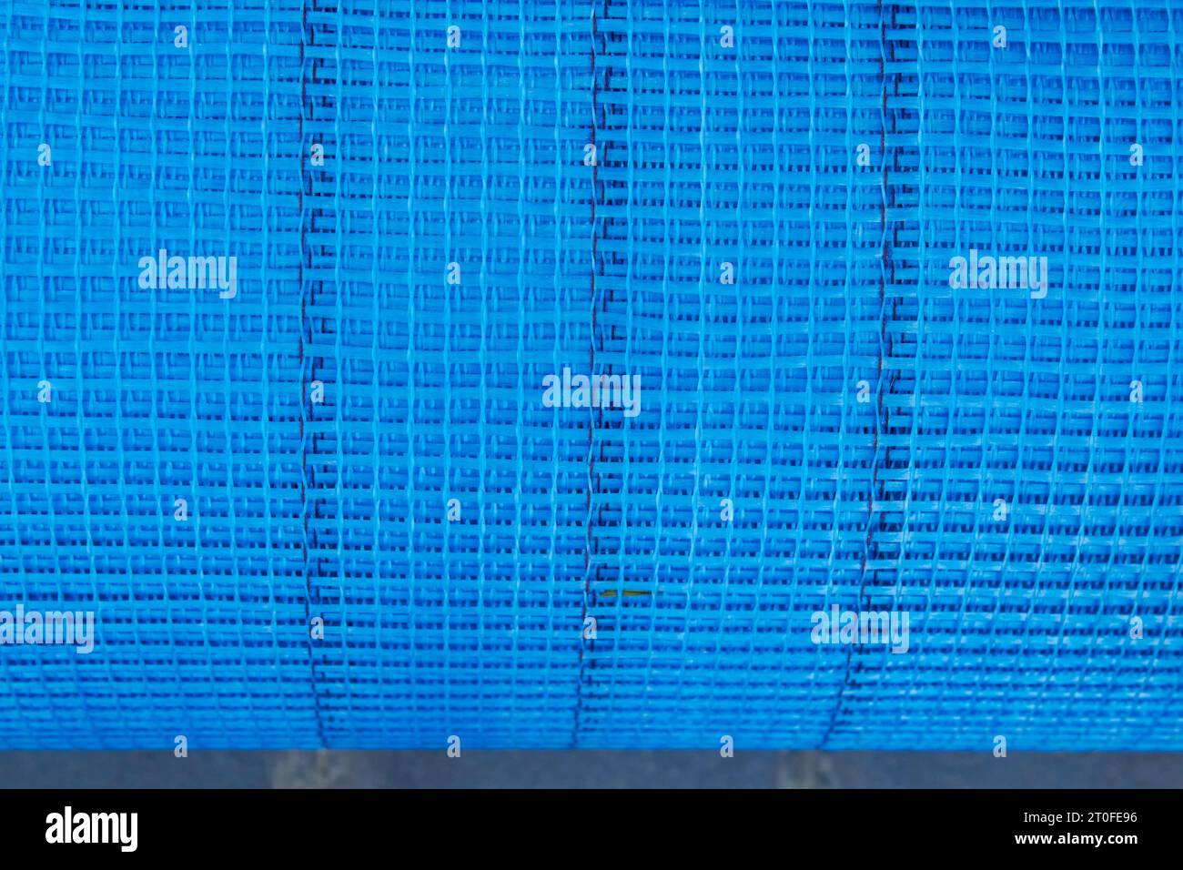 construction grid in a roll for a house facade Stock Photo - Alamy